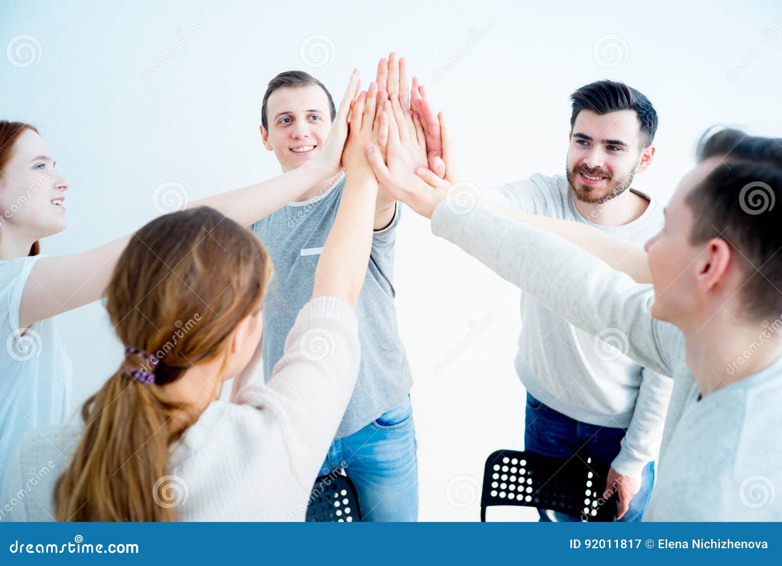 Group of People Giving High Five Stock Image - Image of friends ...
