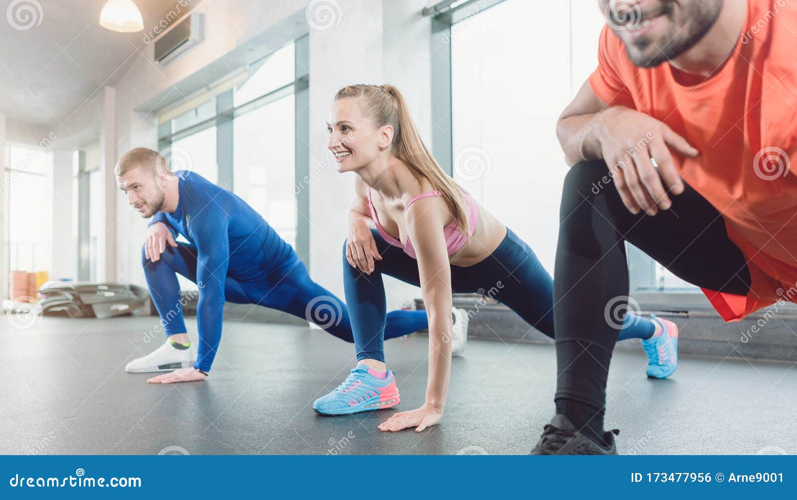Group of People in Gym Fitness Class Stretching Stock Photo - Image of ...