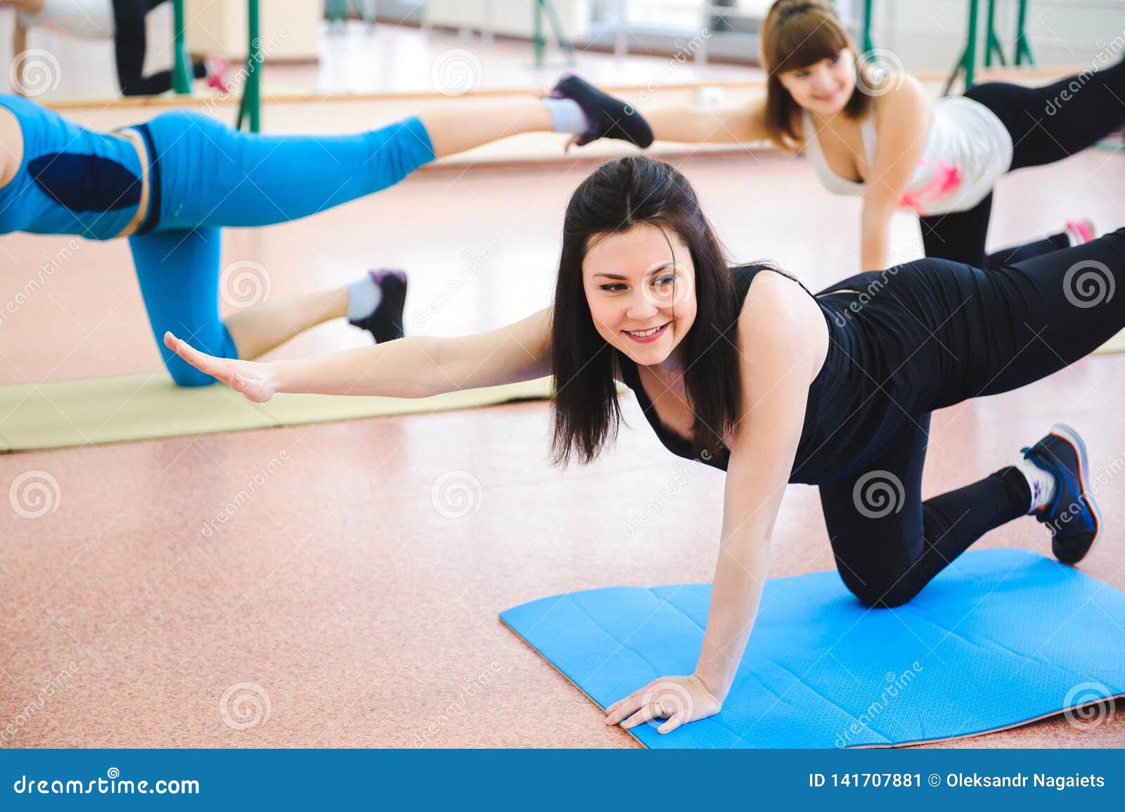 Group of People at the Gym in a Stretching Class. Stock Image - Image ...