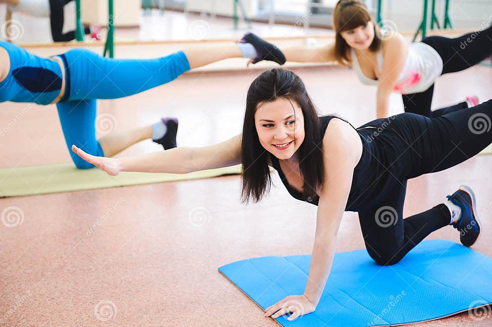 Group of People at the Gym in a Stretching Class. Stock Image - Image ...