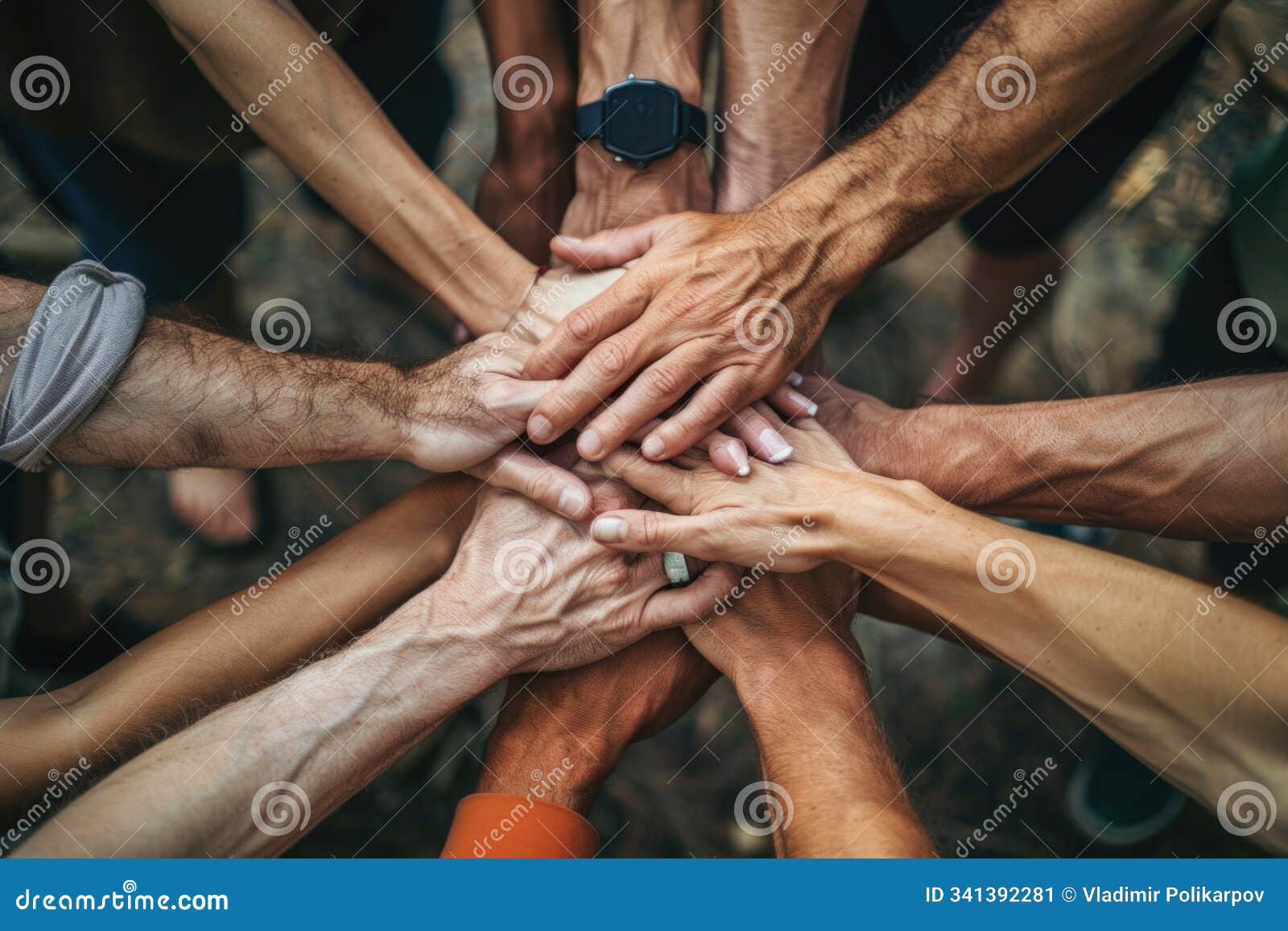 A Group of People with Hands Clasped Together, Demonstrating Unity and ...