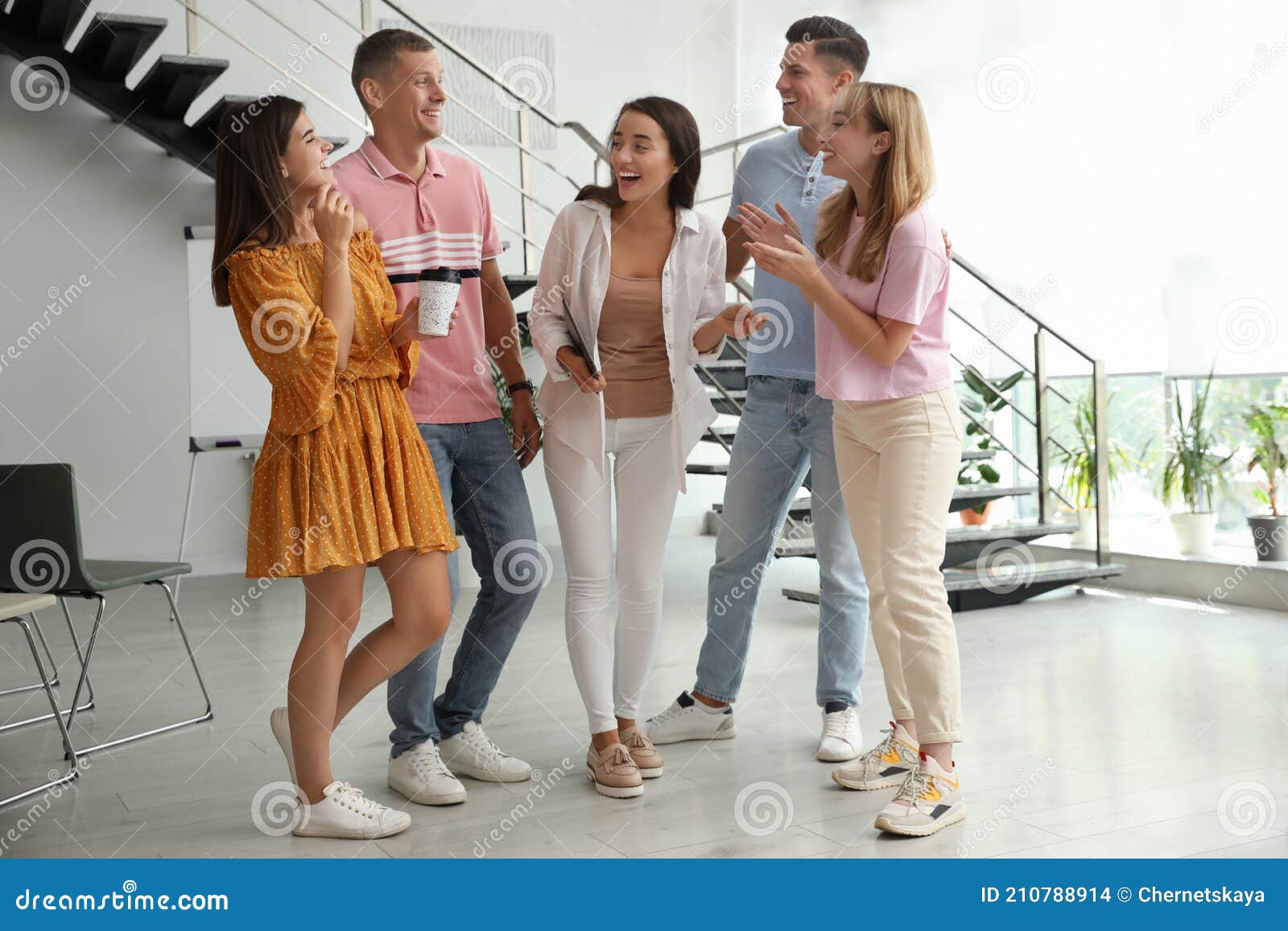Group of People Having Conversation in Hall Stock Photo - Image of ...