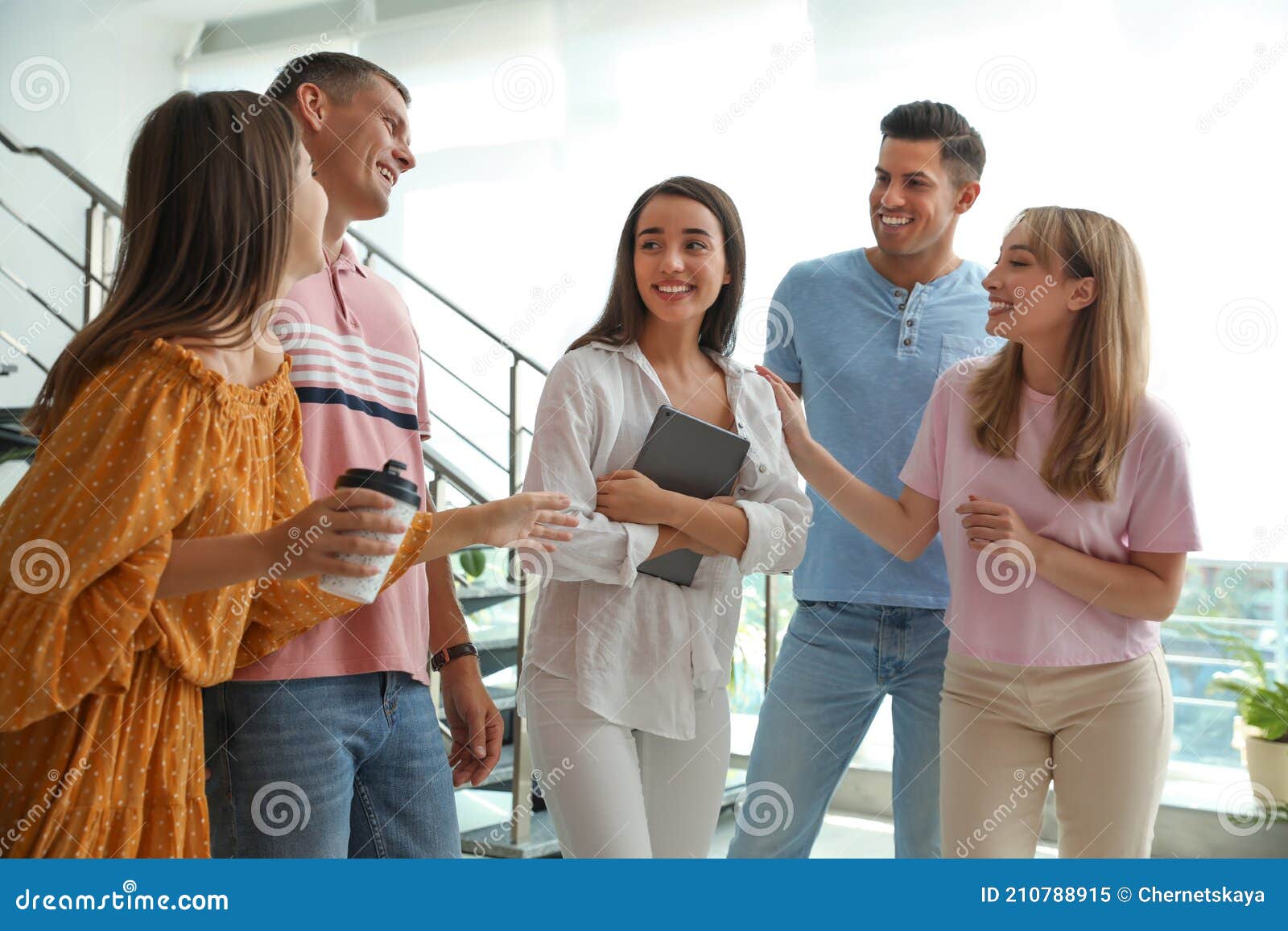 Group of People Having Conversation in Hall Stock Image - Image of ...