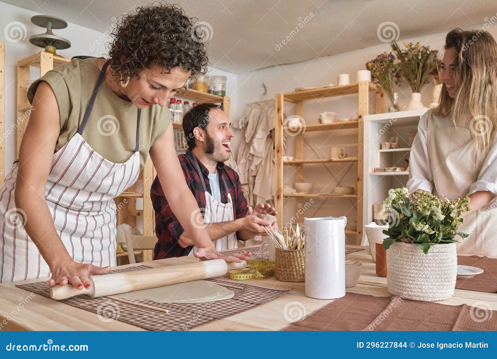 Group of People Having Fun while Creating Crafts in Pottery Workshop ...