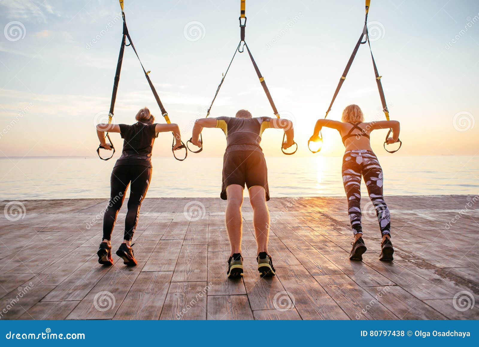Group of People Having Trx Training Stock Photo - Image of plank, rope ...