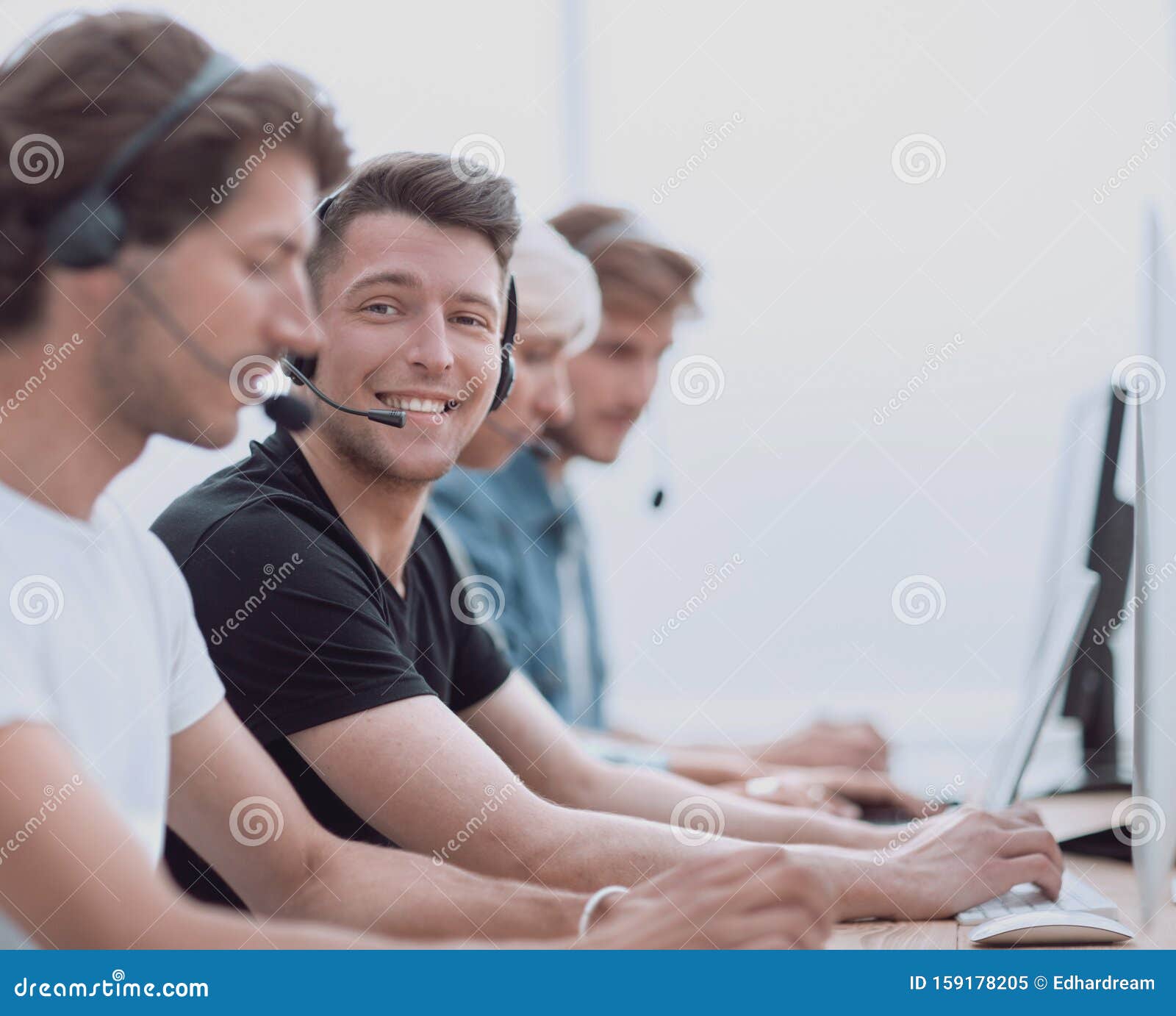 Group of People in the Headset Works on Personal Computers. Stock Image ...