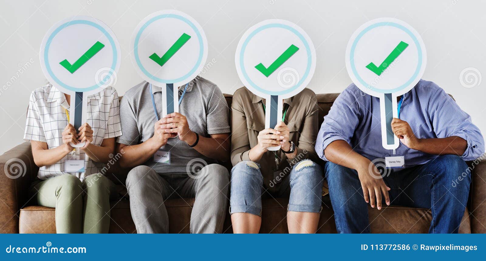 Group of People Holding Check Icons Stock Photo - Image of outfit ...