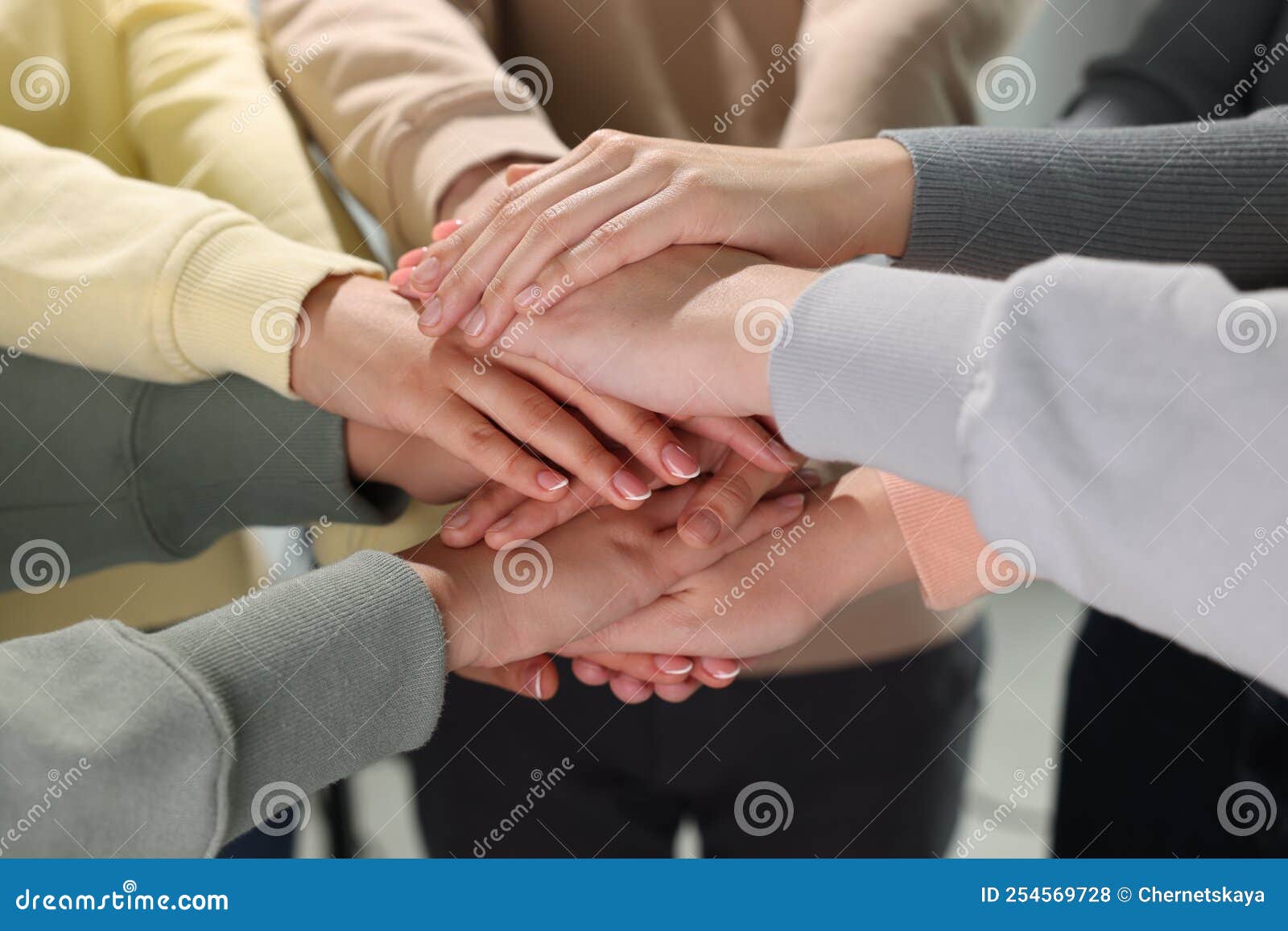 Group of People Holding Hands Together Indoors, Closeup. Unity Concept ...