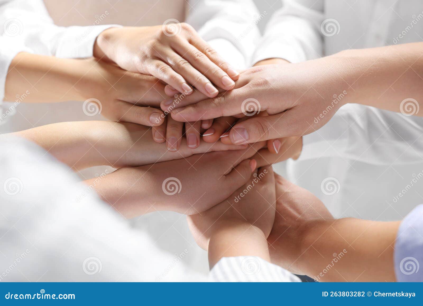 Group of People Holding Hands Together Indoors, Closeup. Unity Concept ...