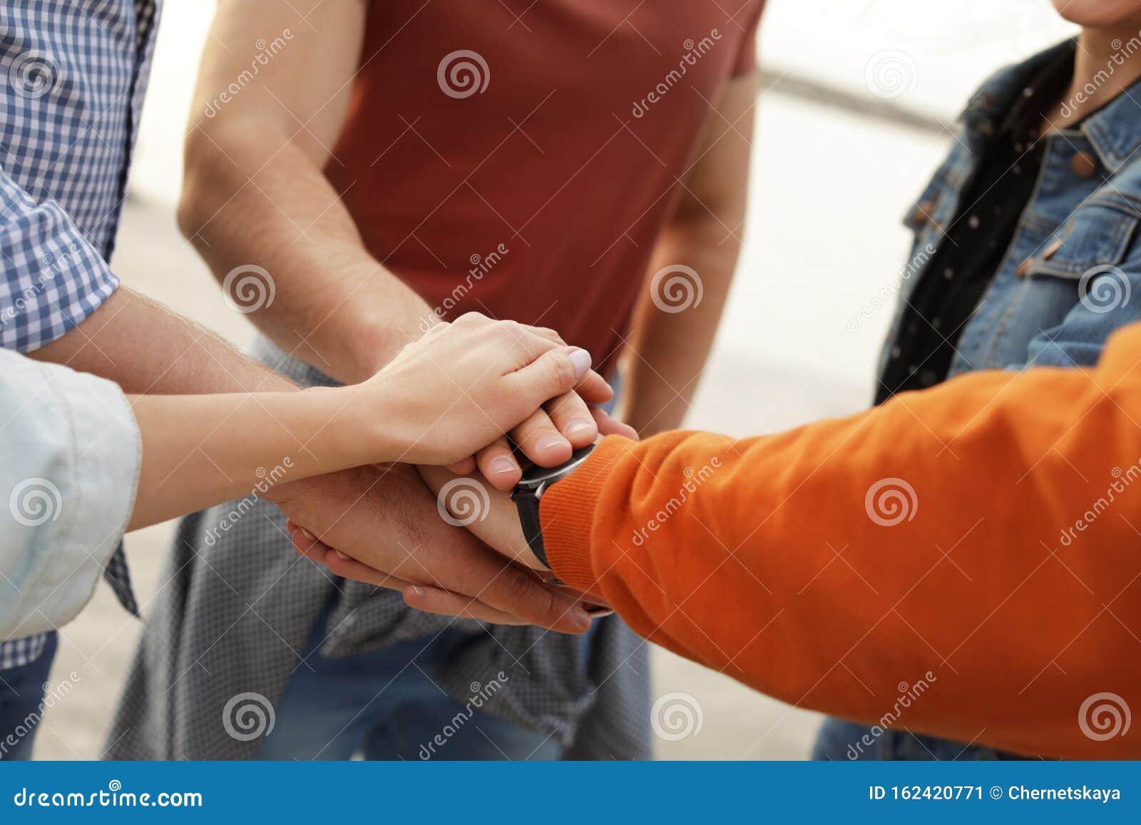 Group of People Holding Hands Together Outdoors Stock Image - Image of ...