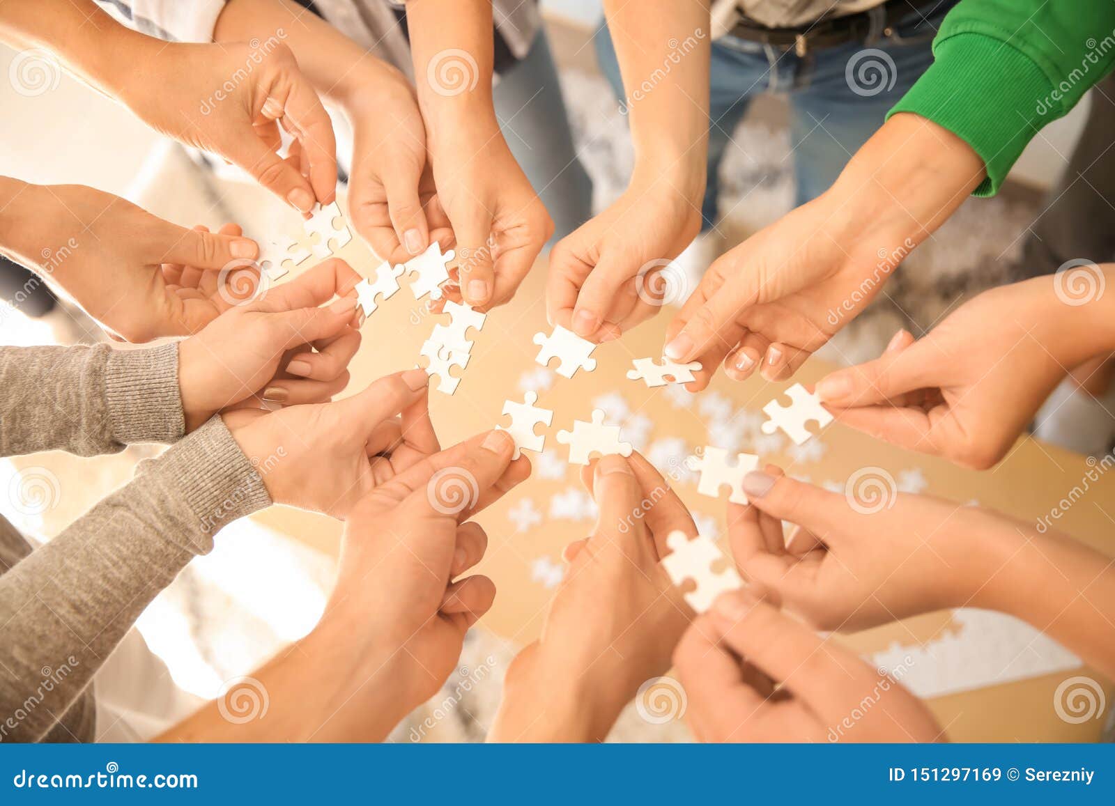 Group of People Holding Pieces of Puzzle Stock Image - Image of male ...