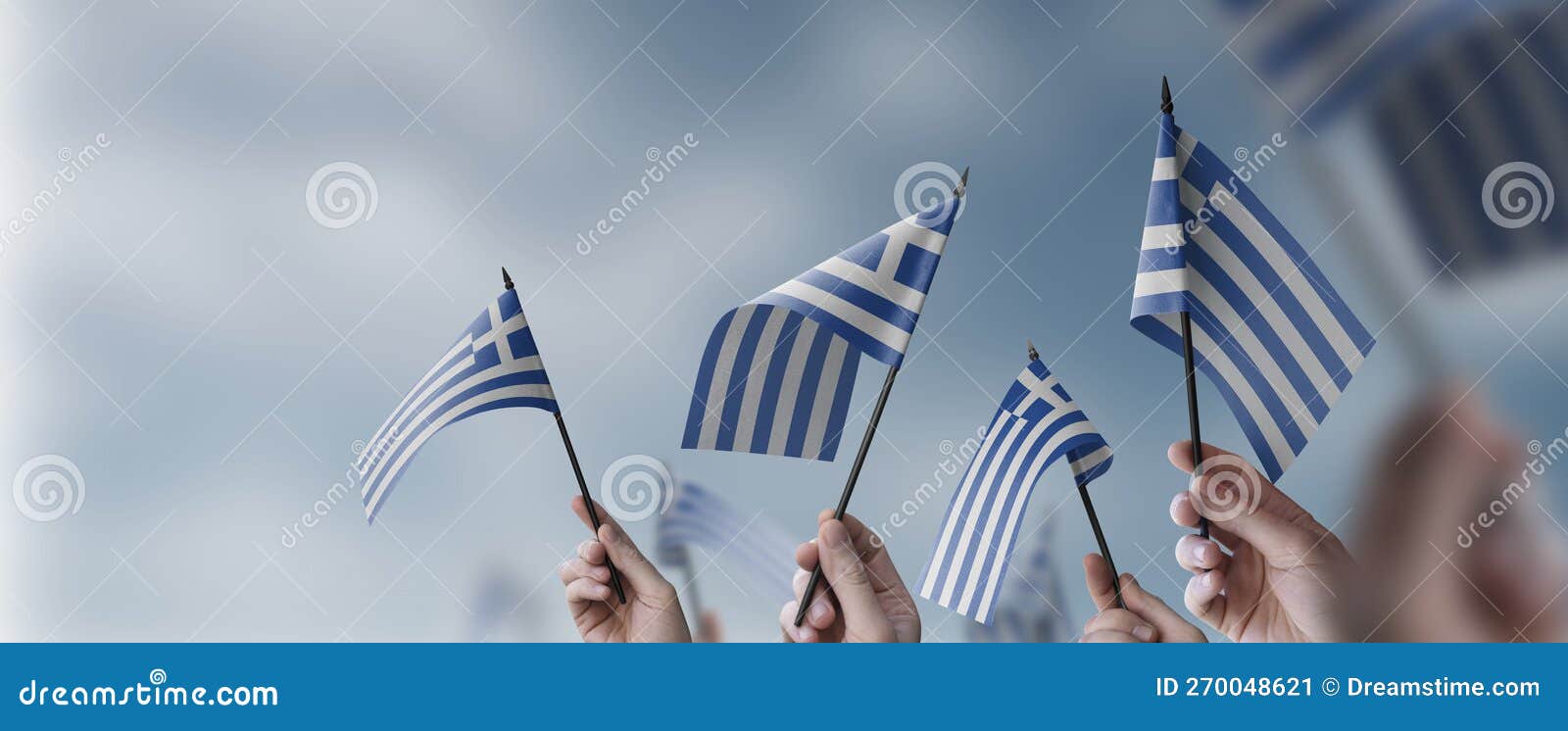 A Group of People Holding Small Flags of the Greece in Their Hands ...