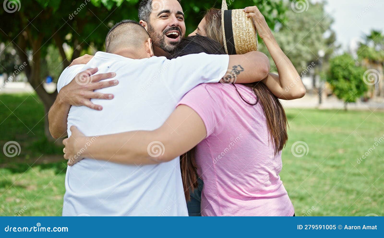 Group of People Hugging Each Other Smiling at Park Stock Image - Image ...