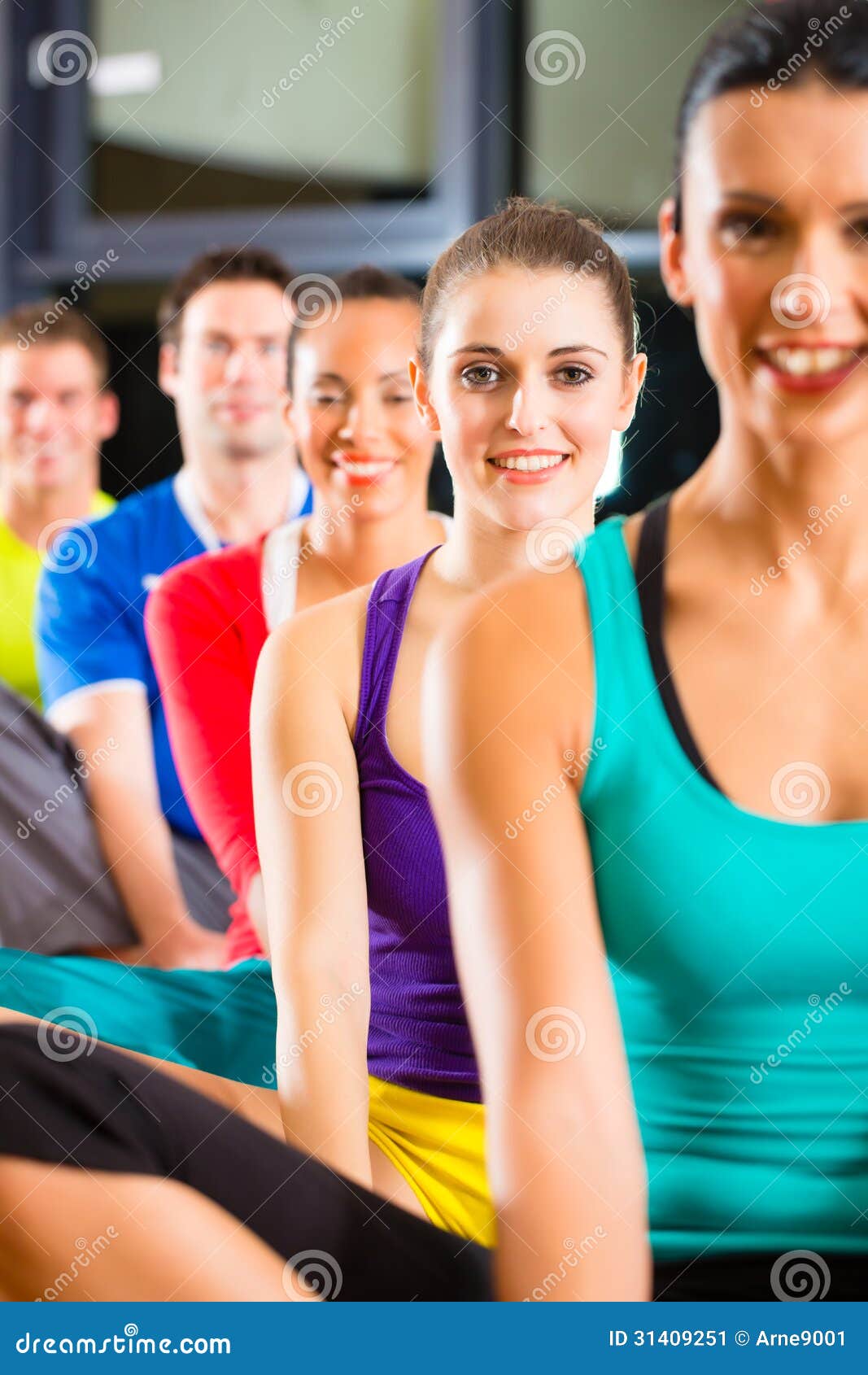 Group of People and Instructor in Gym Stretching Stock Image - Image of ...