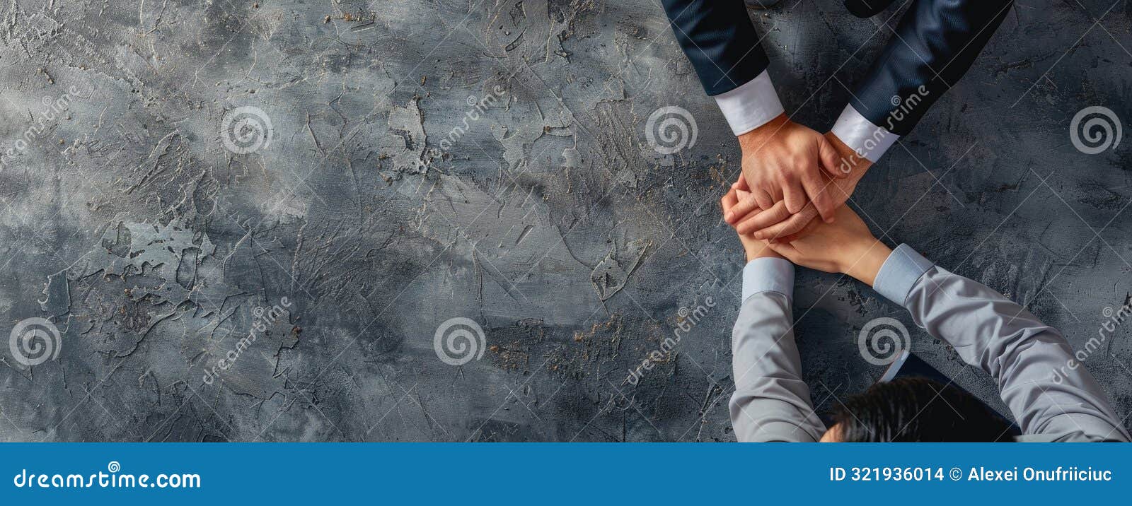 A Group of People Join Hands in a Circular Formation Stock Photo ...