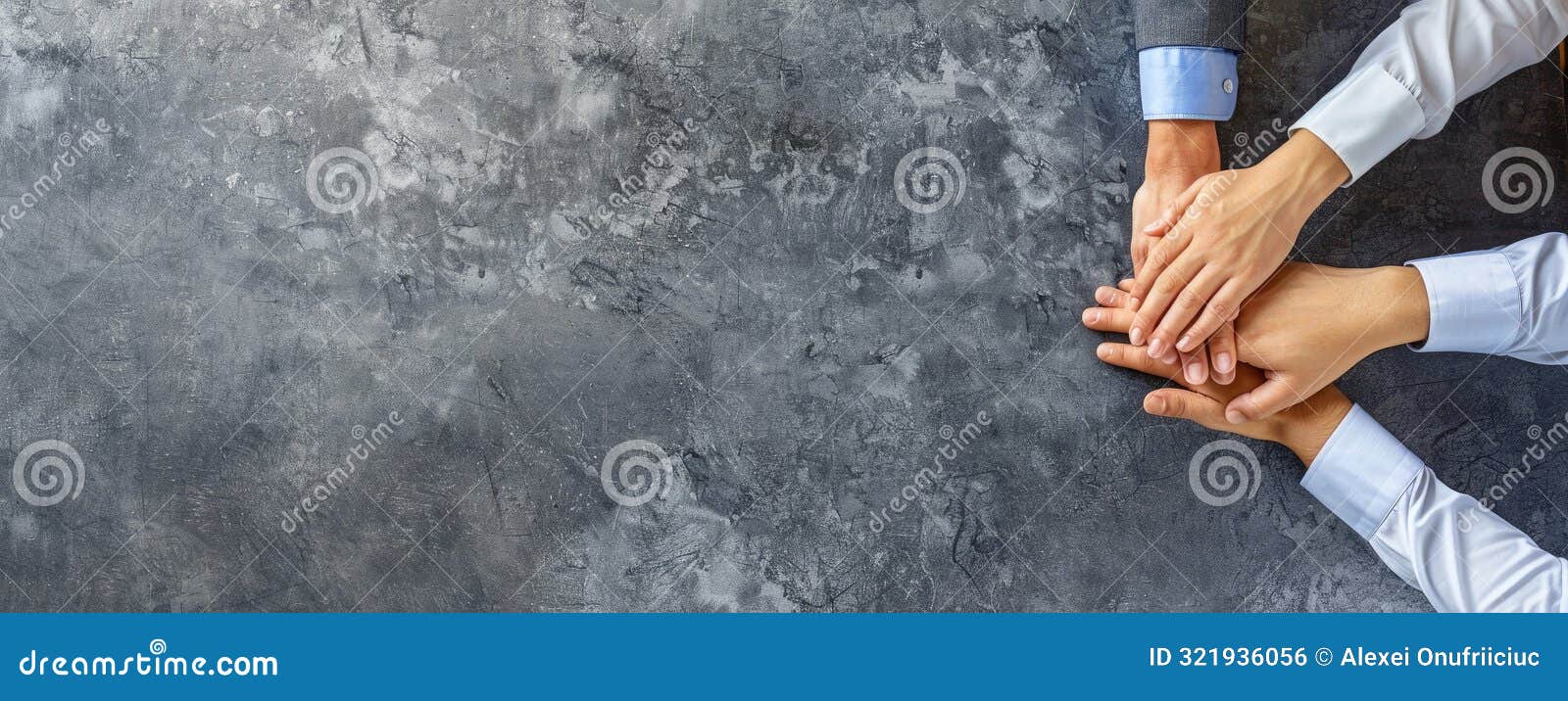 A Group of People Join Hands in a Circular Formation Stock Photo ...
