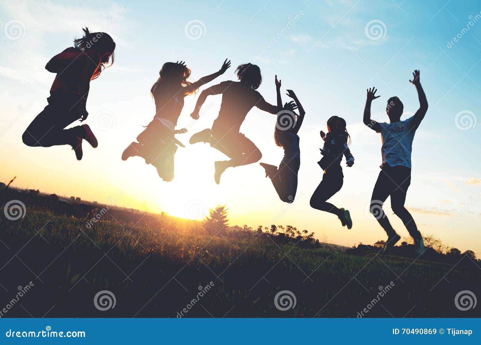 Group of People Jumping Outdoors Stock Image - Image of company ...