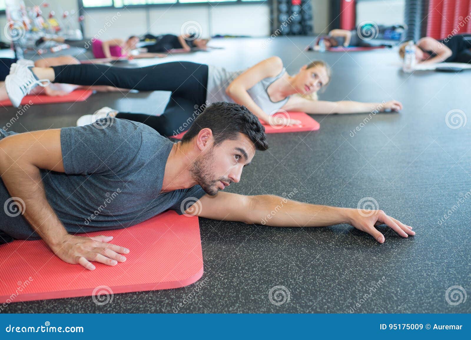 Group People Laying Over Mats in Gym Stock Image - Image of adult ...