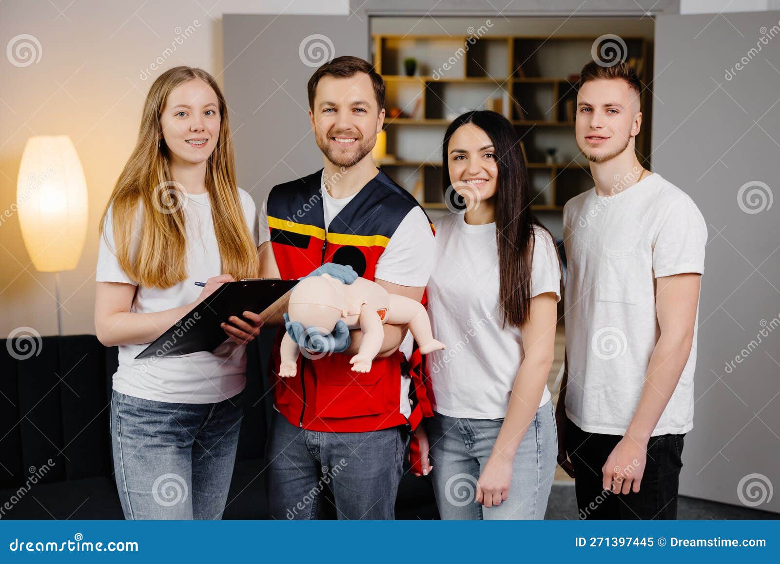 Group of People Learning How To Make First Aid with Dummy Child during ...