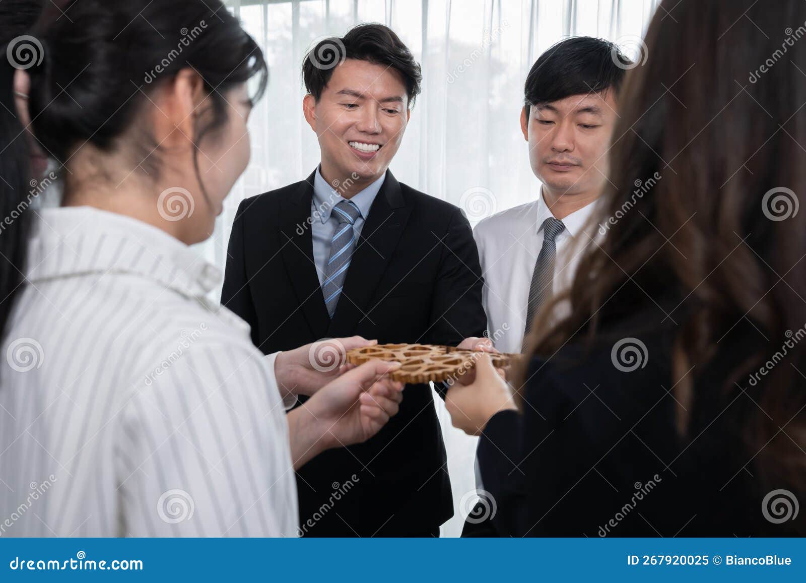 Group of People Making Chain of Gears into Collective Form for Harmony ...