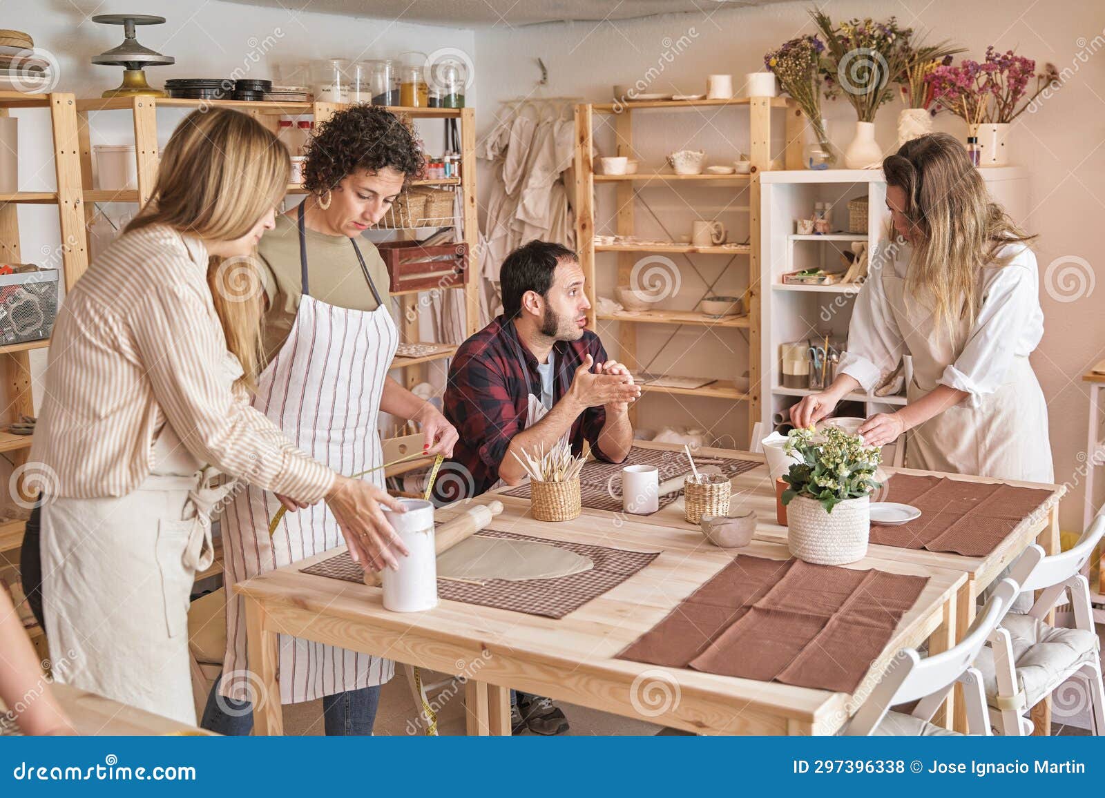 Group of People Making Pottery Crafts in a Workshop. Stock Photo ...