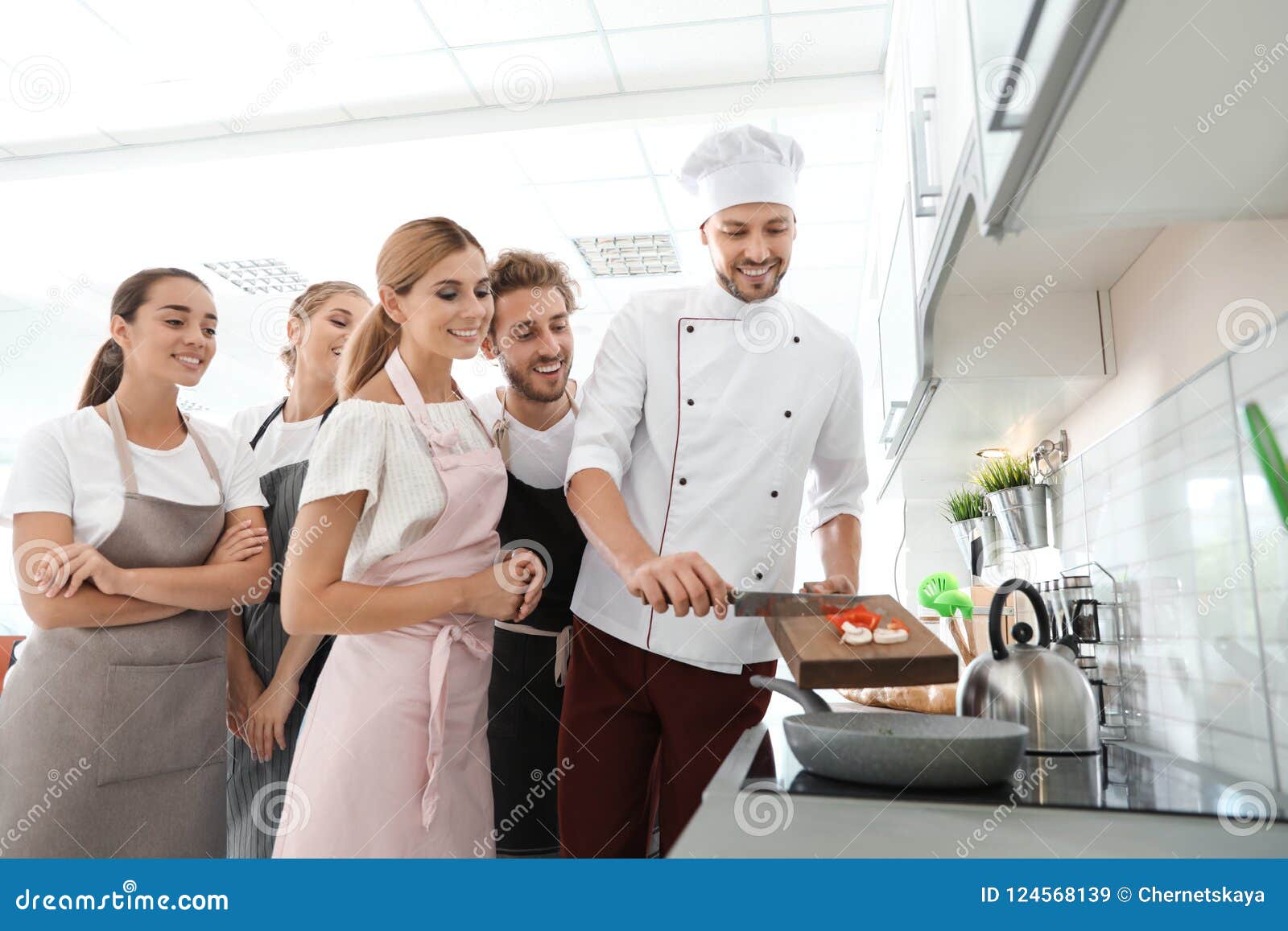 Group of People and Male Chef Stock Image - Image of apprentice, frying ...