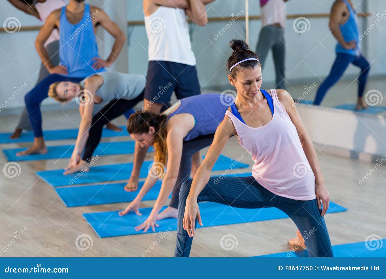 Group of People Performing Stretching Exercise Stock Photo - Image of ...