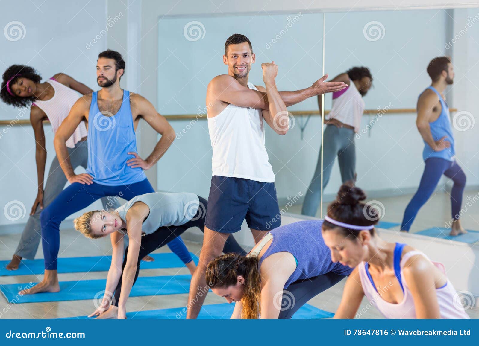 Group of People Performing Stretching Exercise Stock Photo - Image of ...