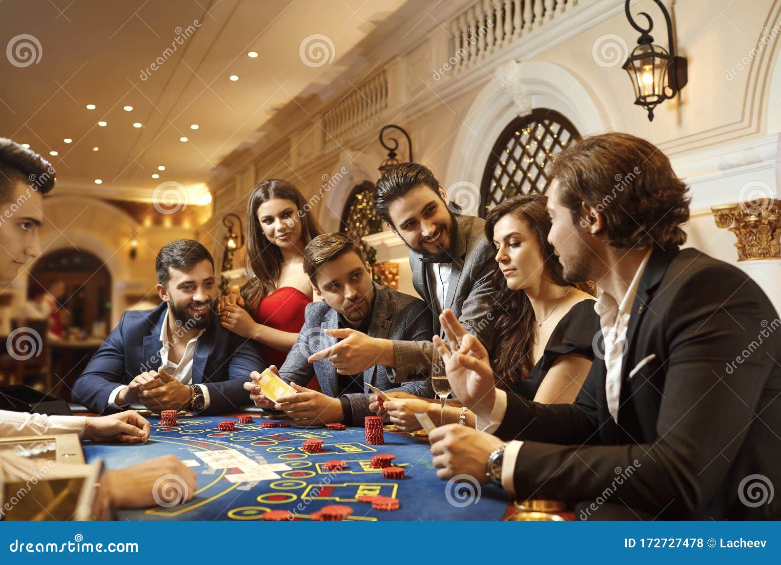 A Group of People Playing Gambling in a Casino Stock Photo - Image of ...