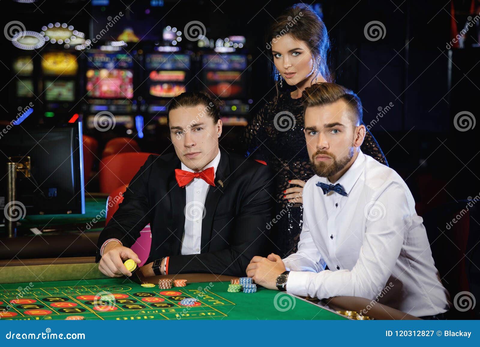 Group of People Playing Roulette in the Casino Stock Image - Image of ...