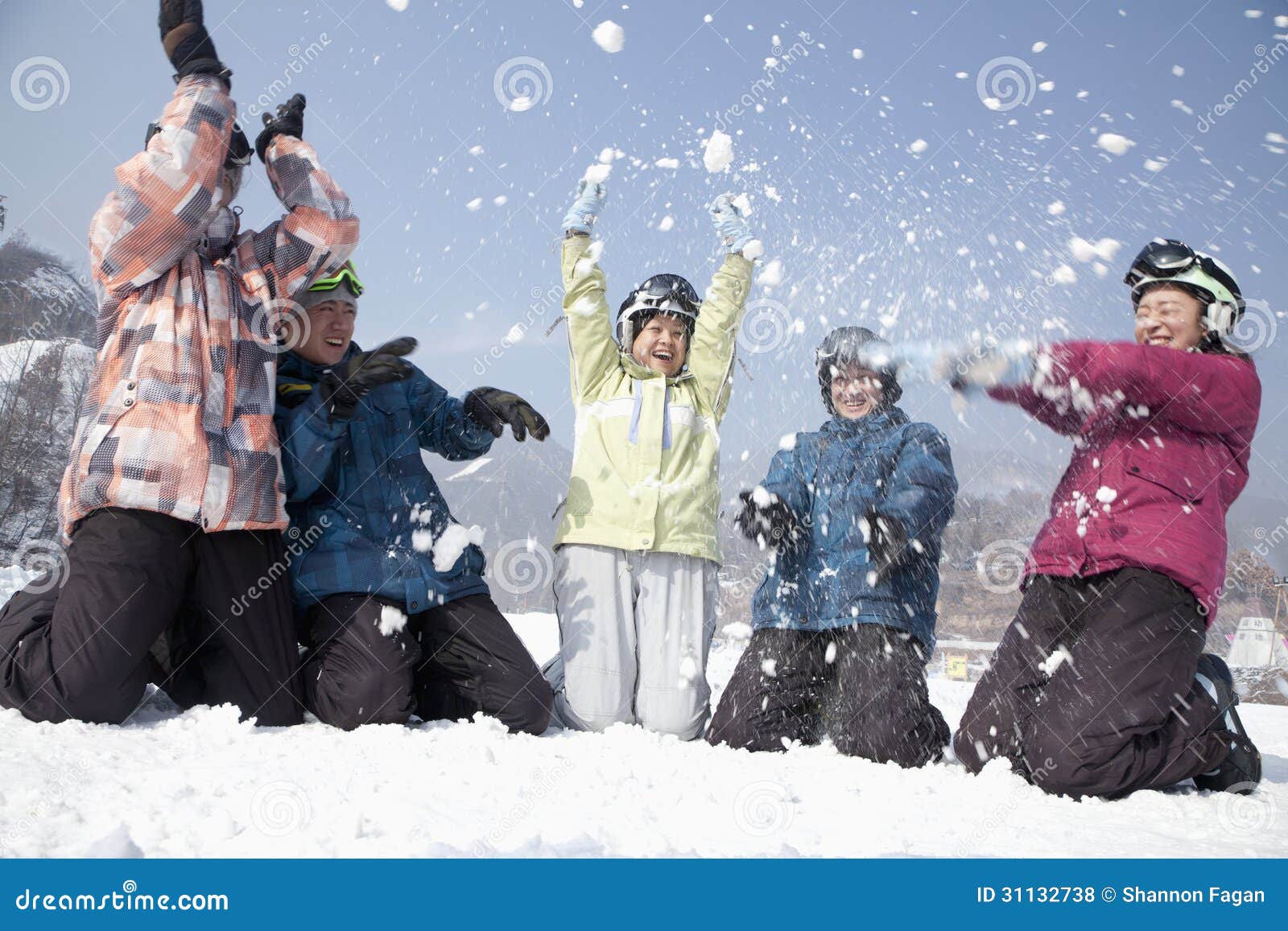 Group of People Playing in the Snow in Ski Resort Stock Photo - Image ...