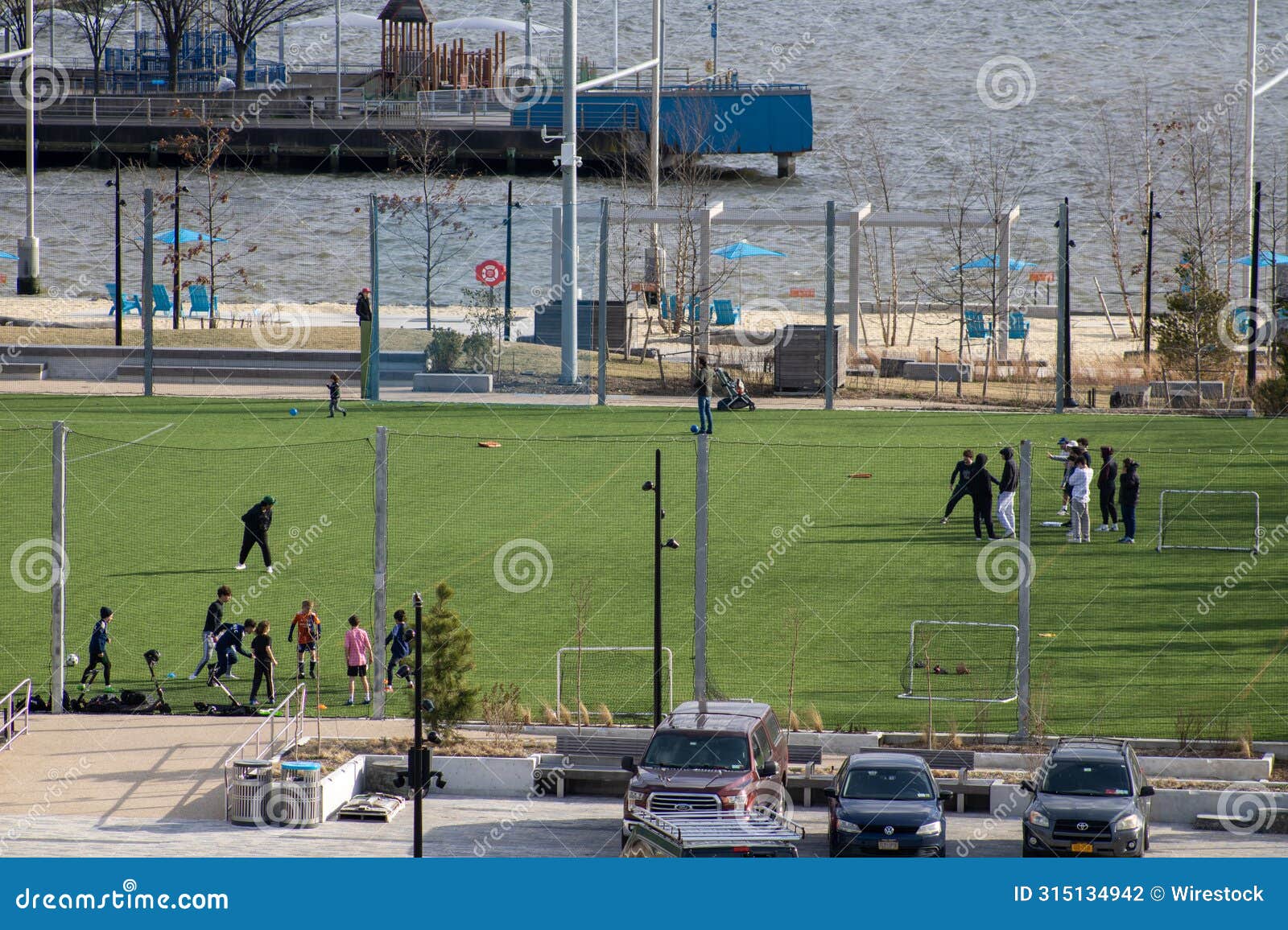 Group of People Playing on a Soccer Field Editorial Photography - Image ...