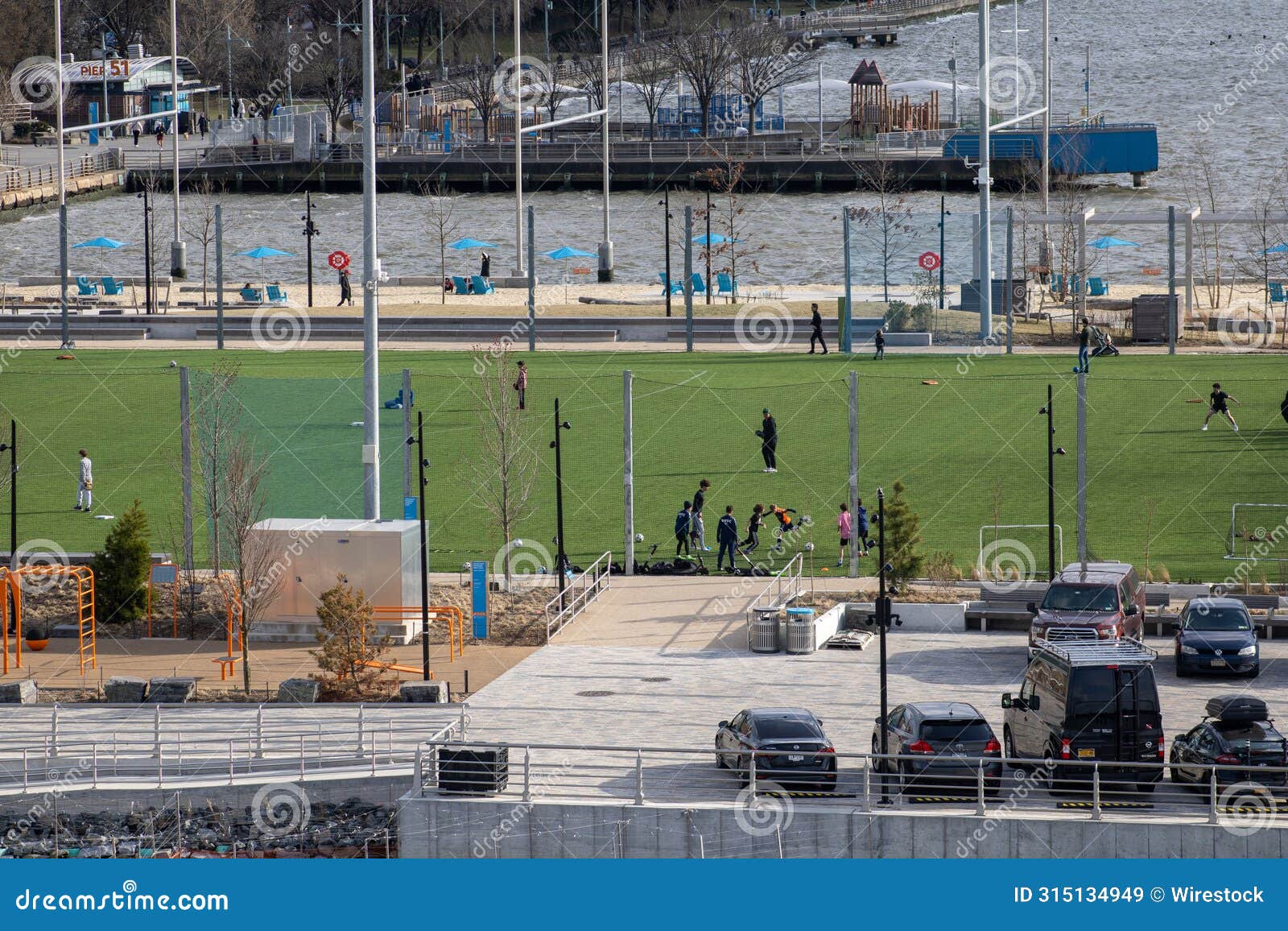 Group of People Playing on a Soccer Field Editorial Stock Image - Image ...