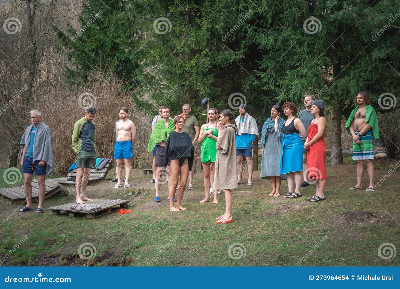 Group of People Preparing for Ice Bathing Together in Cold Water of a ...