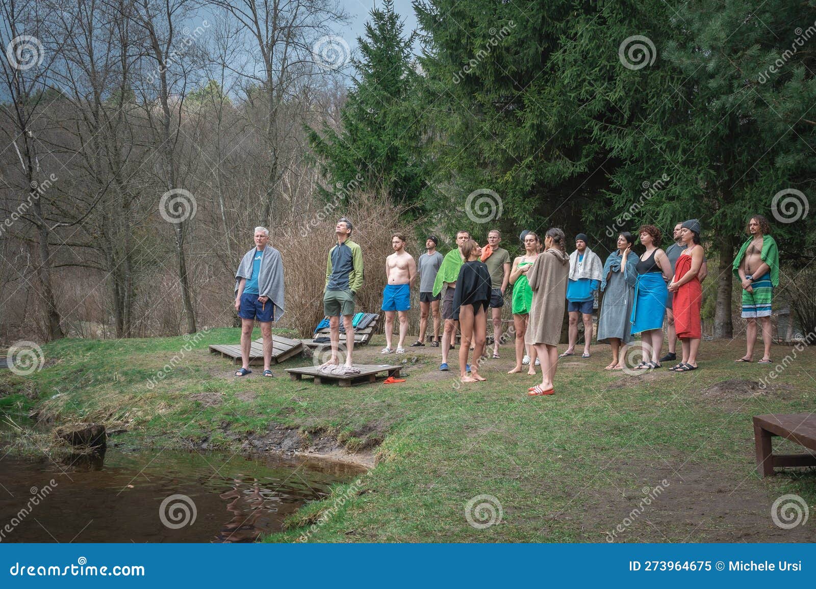 Group of People Preparing for Ice Bathing Together in Cold Water of a ...