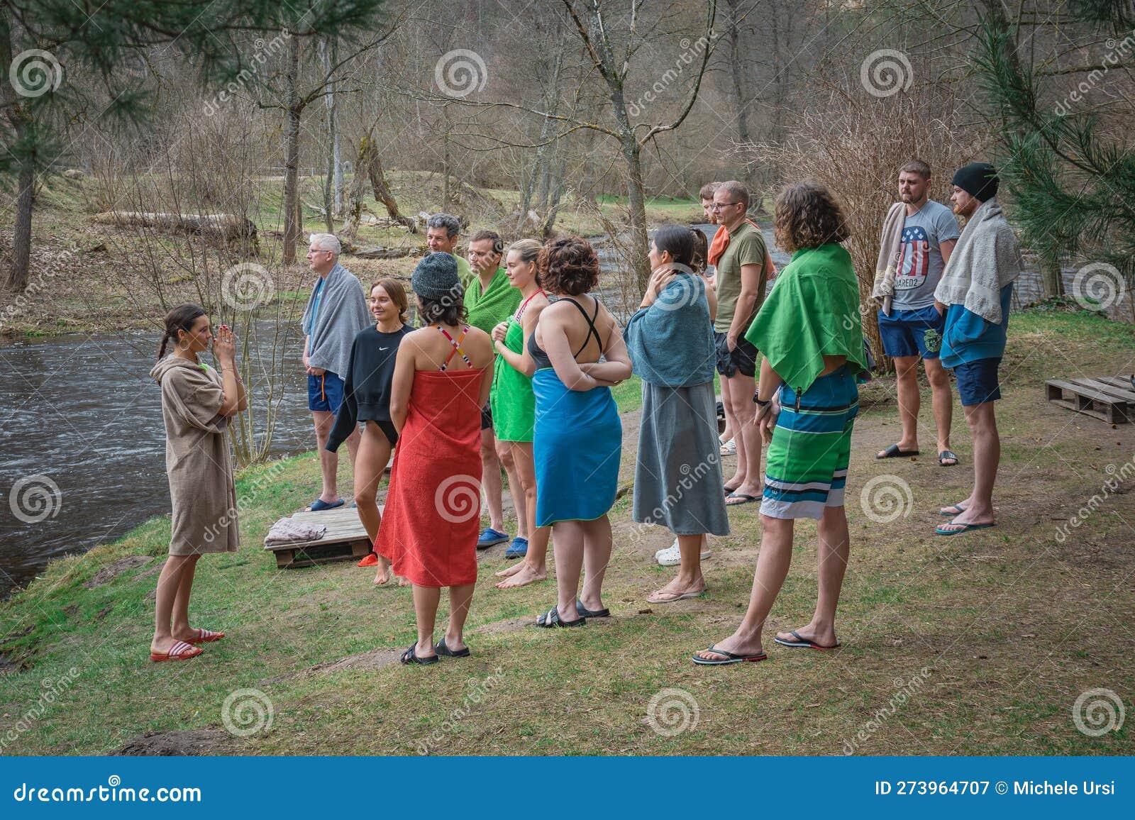 Group of People Preparing for Ice Bathing Together in Cold Water of a ...