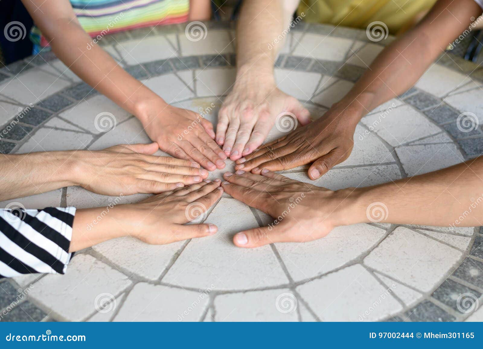 Group of People Putting Hands Together on Table Stock Photo - Image of ...