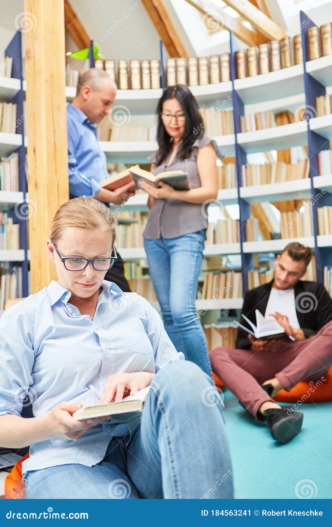 Group of People at Book Reading in Library Stock Image - Image of ...