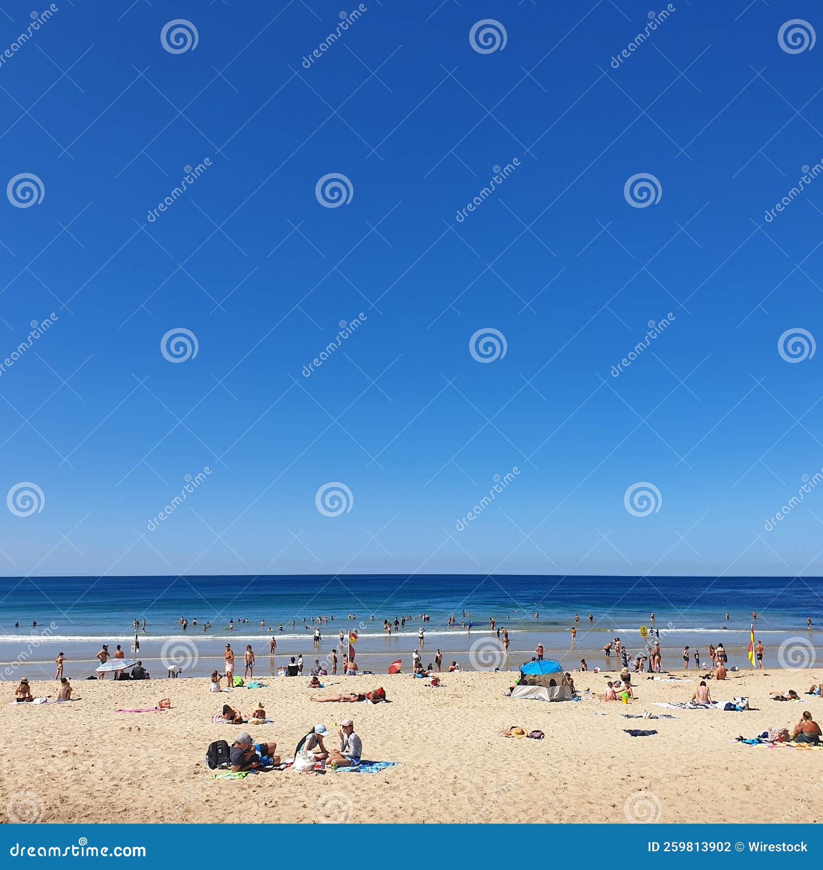 Group of People Relaxing on Sand at the Beach Editorial Photography ...