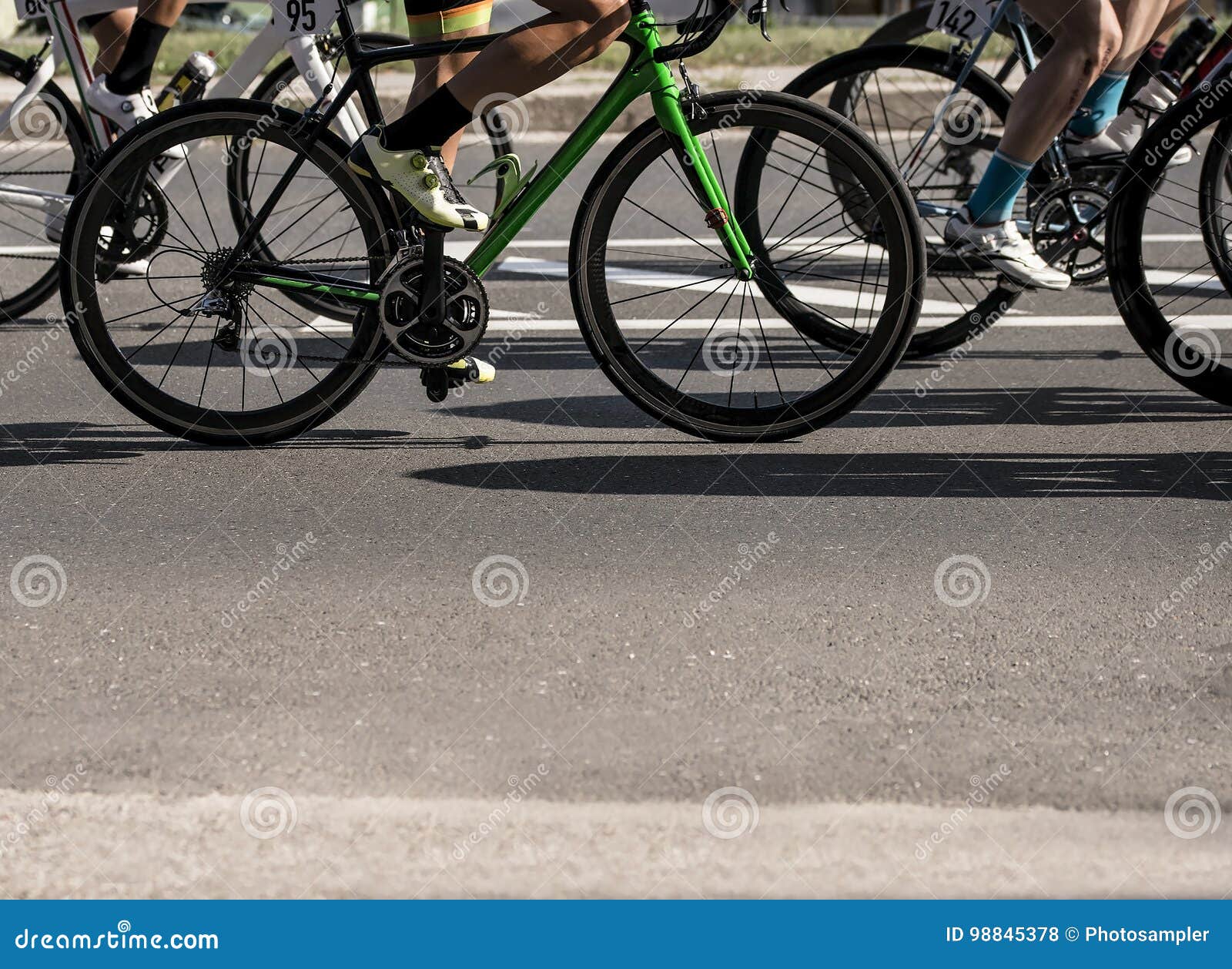 Group of People Riding Bikes Stock Photo - Image of road, active: 98845378