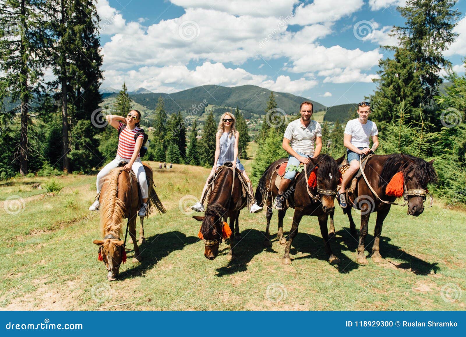 Group of People Riding Horses in the Mountains Stock Photo - Image of ...