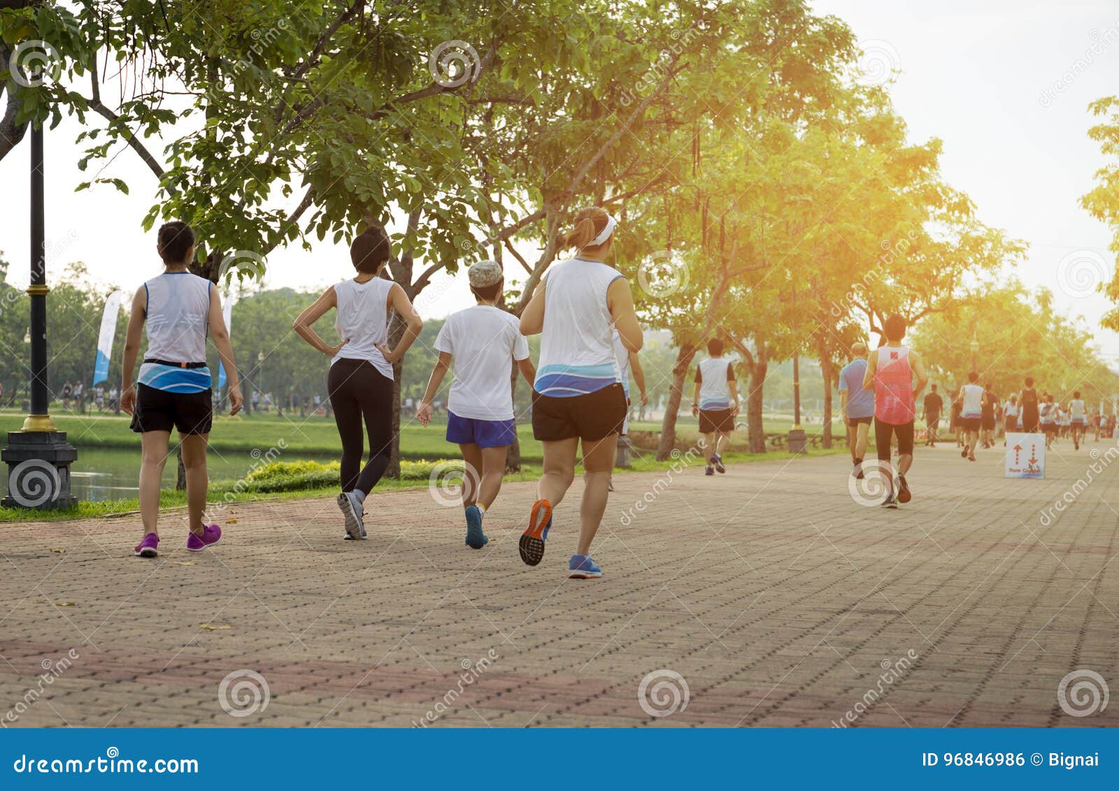 Group Of Marathon Runners Pushing Running Wheel Chairs With Disabled ...