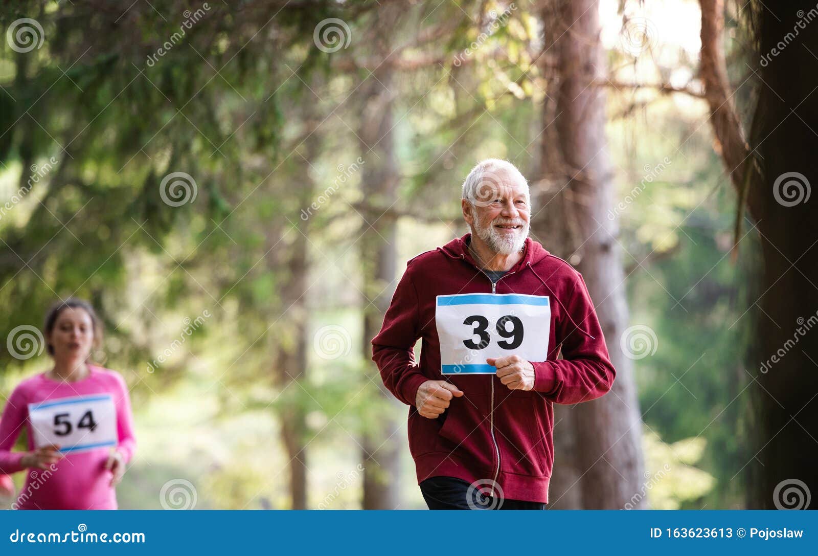 Group of People Running a Race Competition in Nature. Stock Image ...