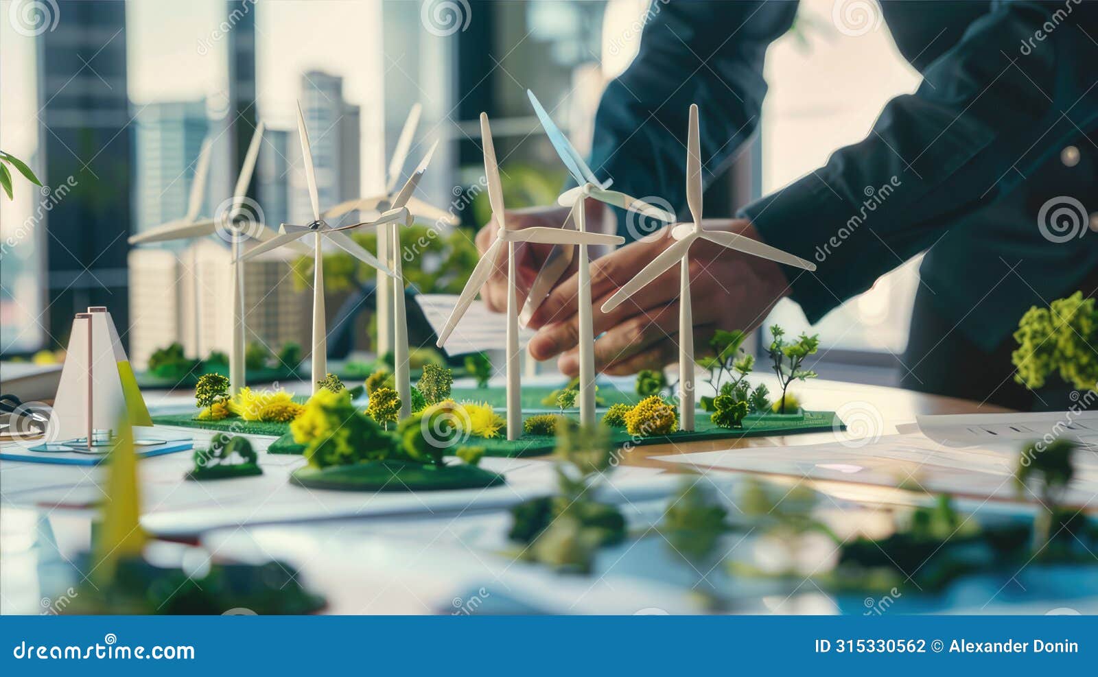 Group Sharing Fun Engineering Ideas at Table with Wind Turbine Models ...