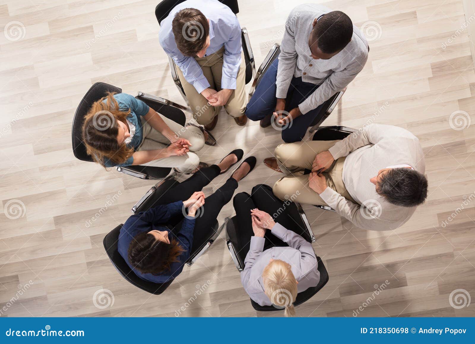 Group of People Sitting on Chair in Circle Stock Photo - Image of ...