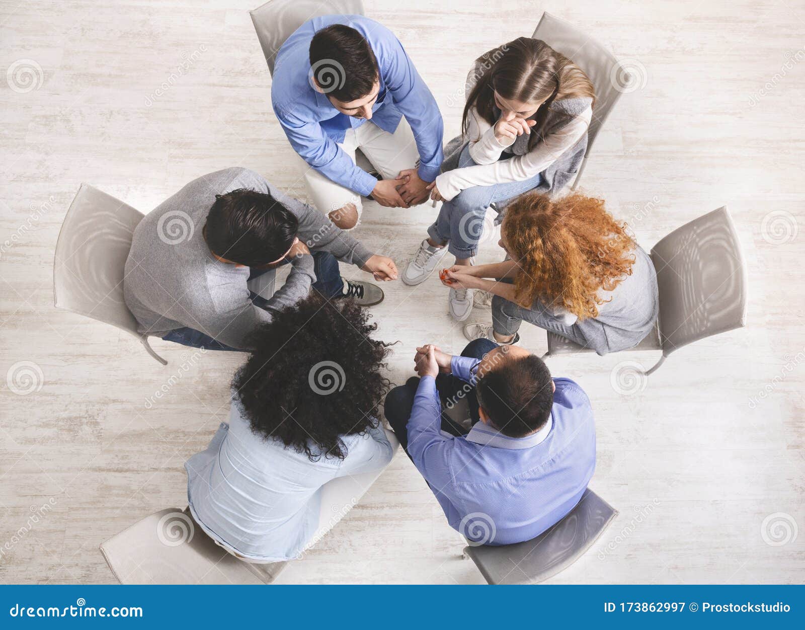Group of People Sitting in Circle, Dicussing Problems during Therapy ...