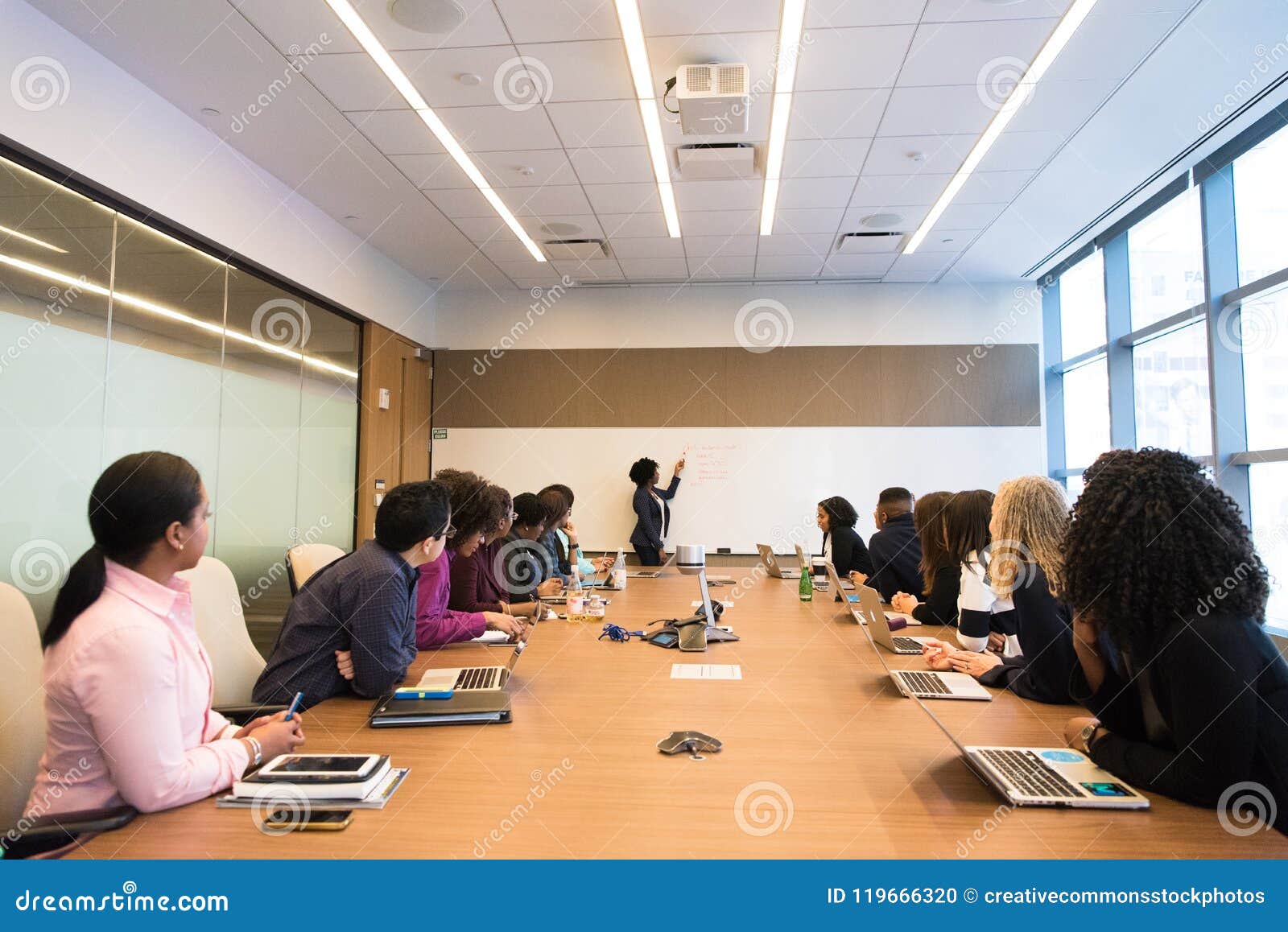Group Of People Sitting Near Table Picture. Image: 119666320