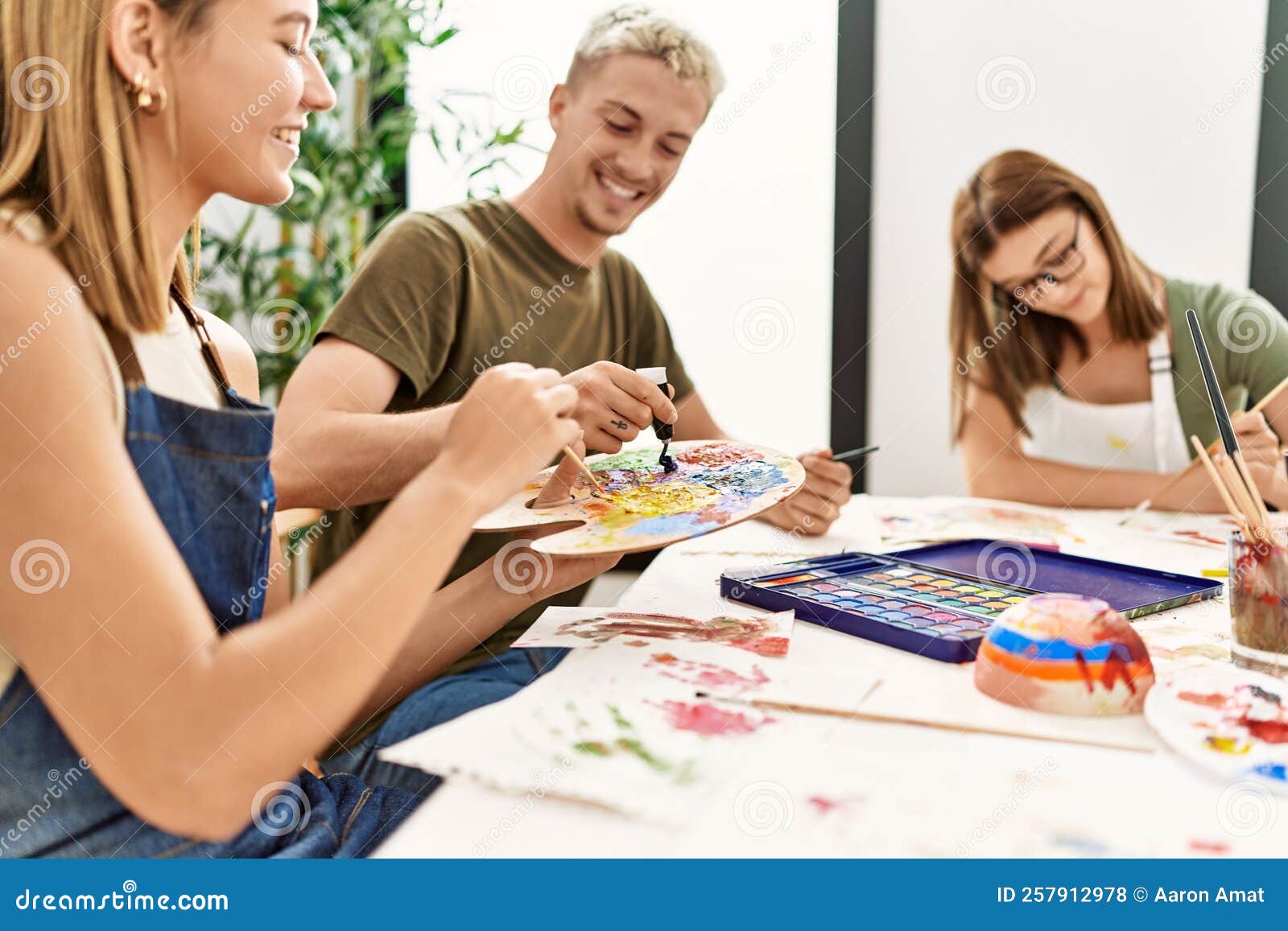 Group of People Sitting on the Table Drawing at Art Studio Stock Photo ...