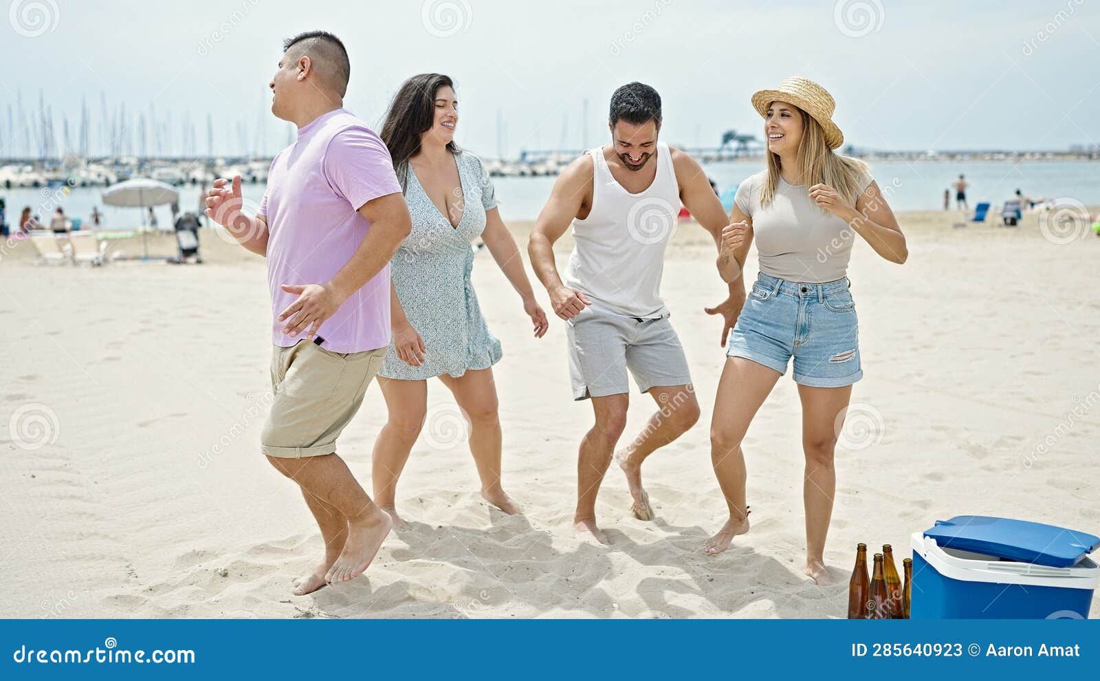Group of People Smiling Confident Dancing at Beach Stock Image - Image ...