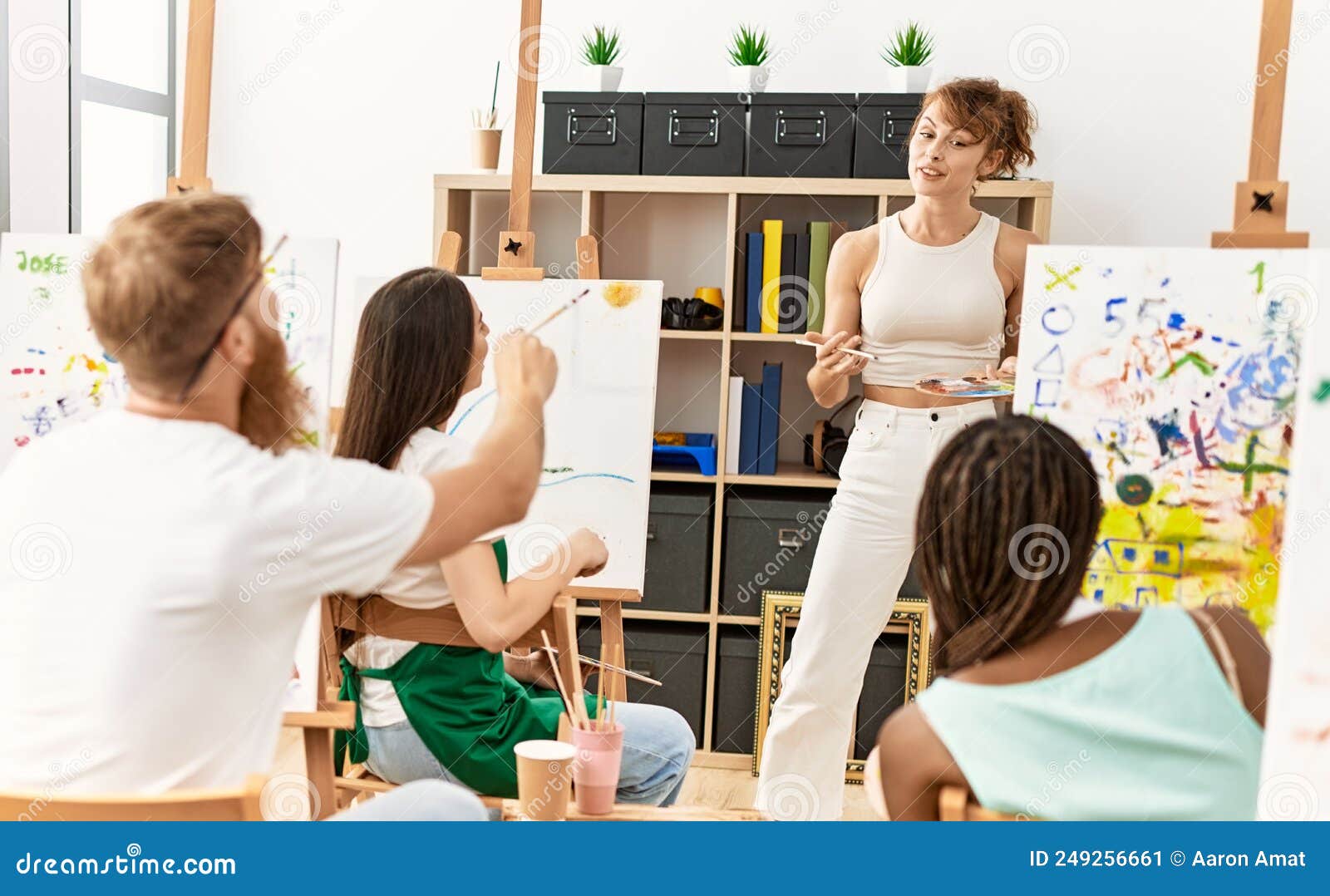 Group of People Smiling Happy Drawing in Paint Class at Art Studio ...